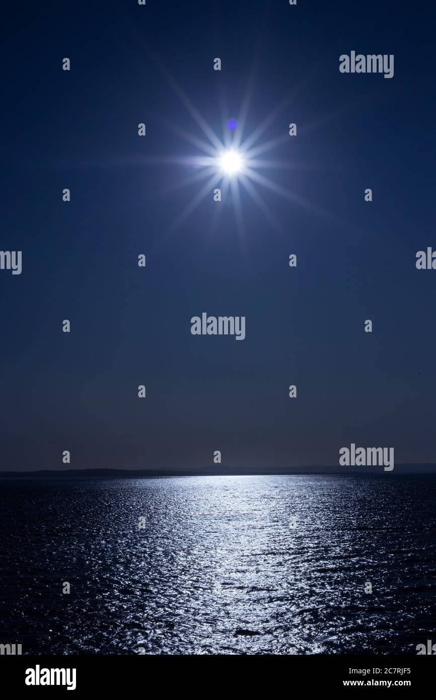 Sunrise sun reflecting on sea hi-res stock photography and images - Alamy