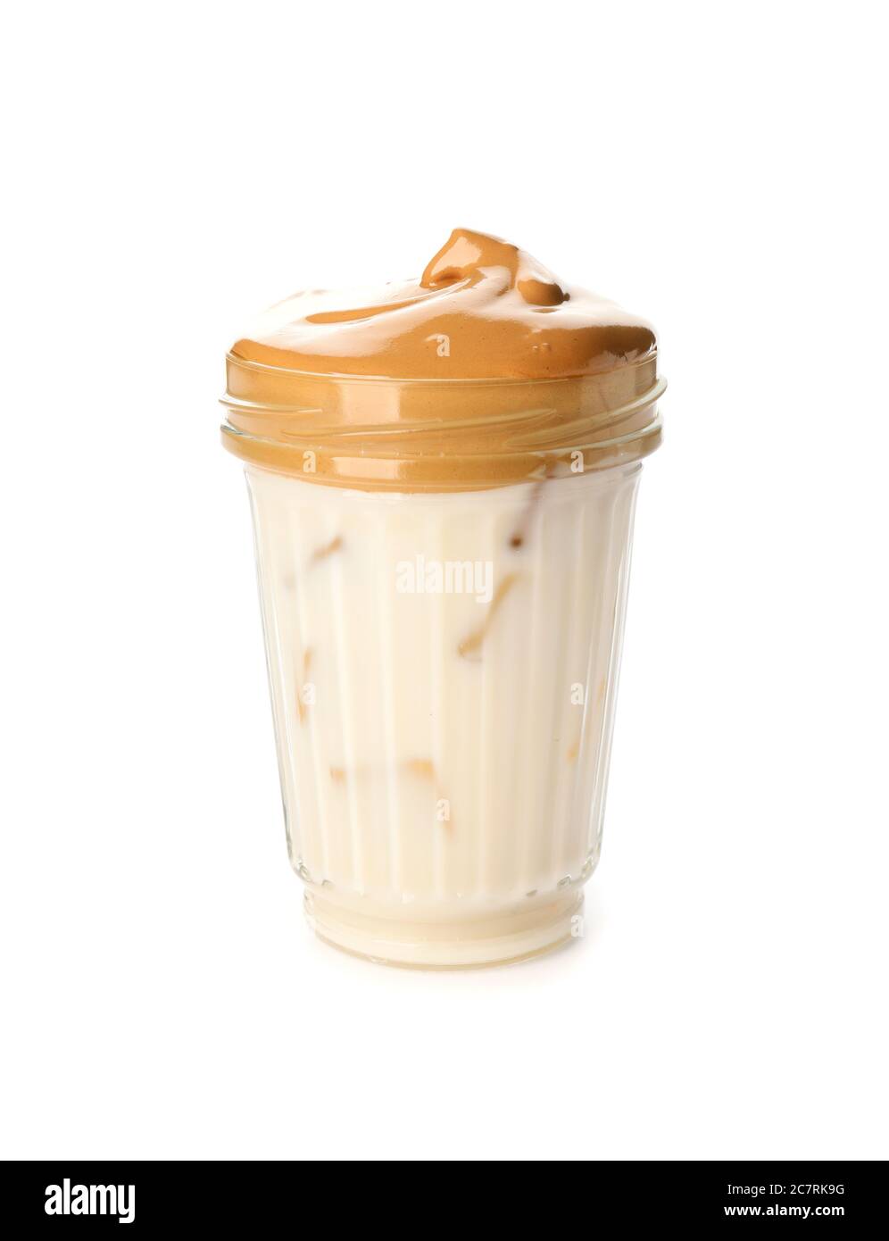 Glass of tasty dalgona coffee on white background Stock Photo - Alamy