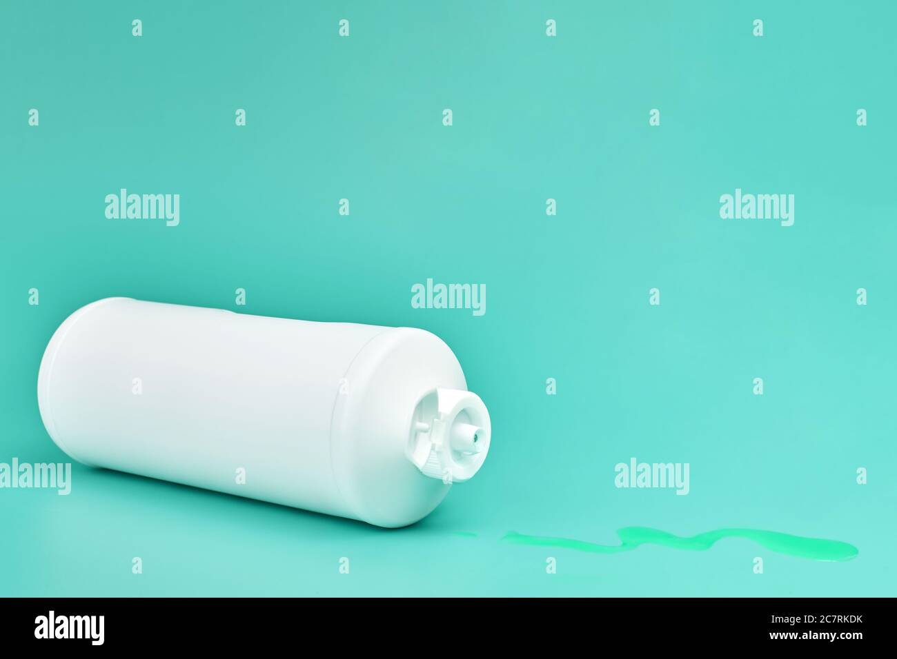 Kitchen detergent bottle and spilled detergent, copy space. Cleaning ...