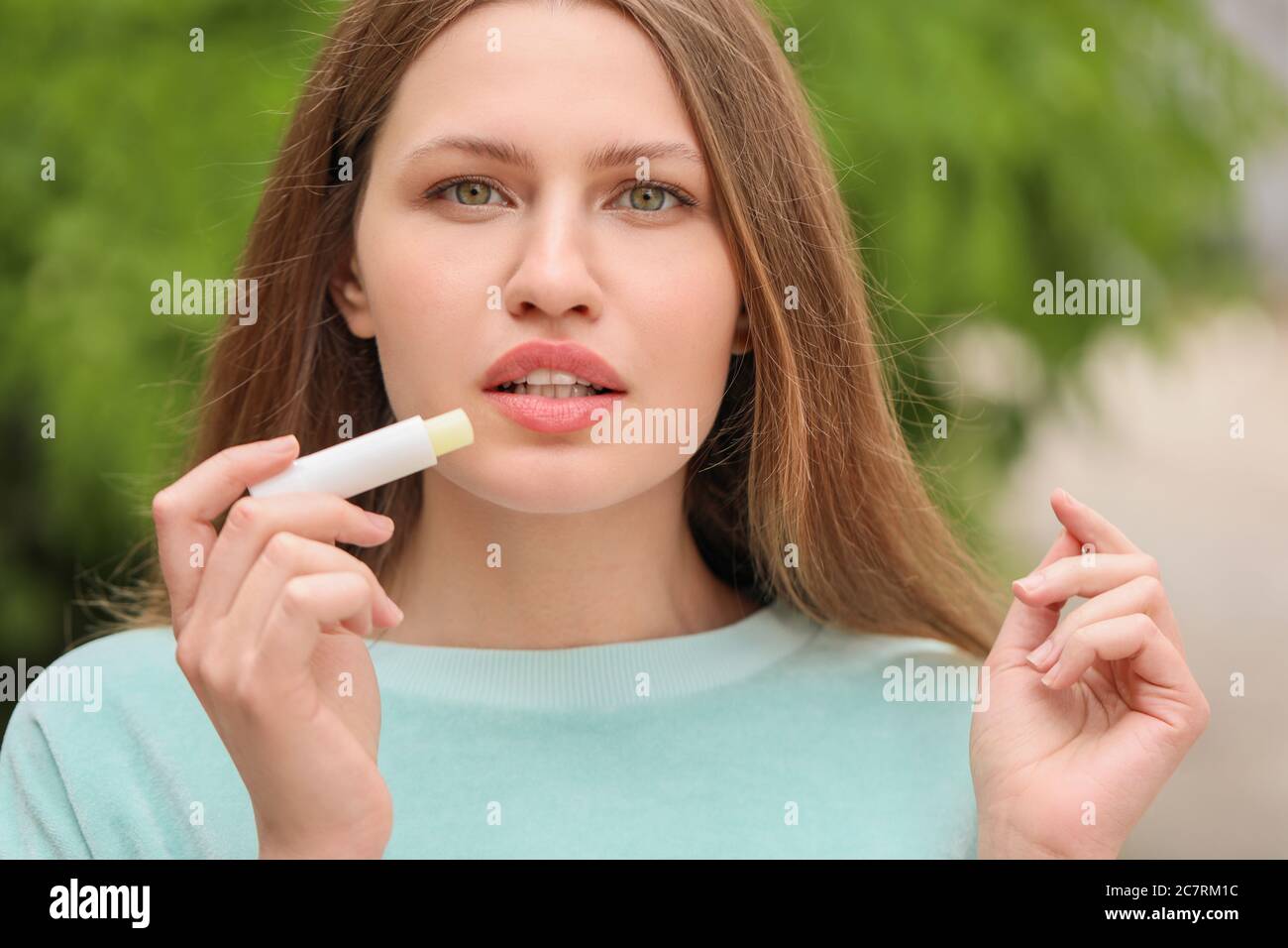 Woman lip balm hi-res stock photography and images - Alamy