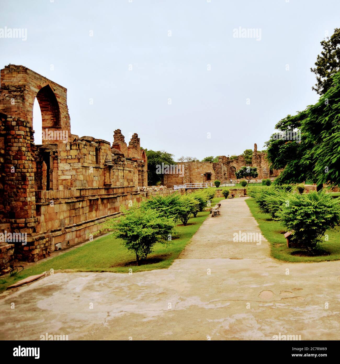 Inside the Qutub Minar Complex with antic ruins and inner square ...