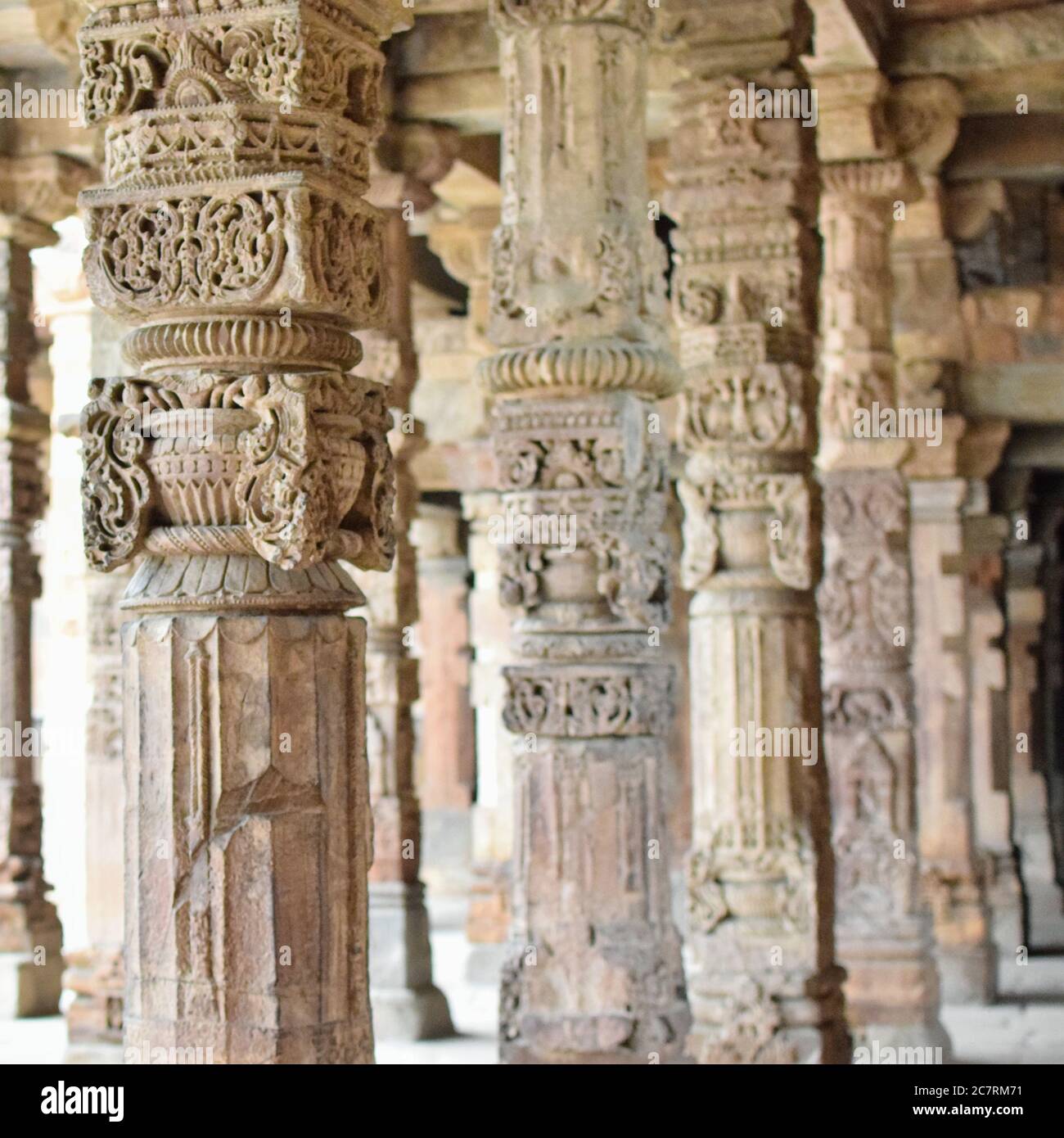 Inside the Qutub Minar Complex with antic ruins and inner square ...
