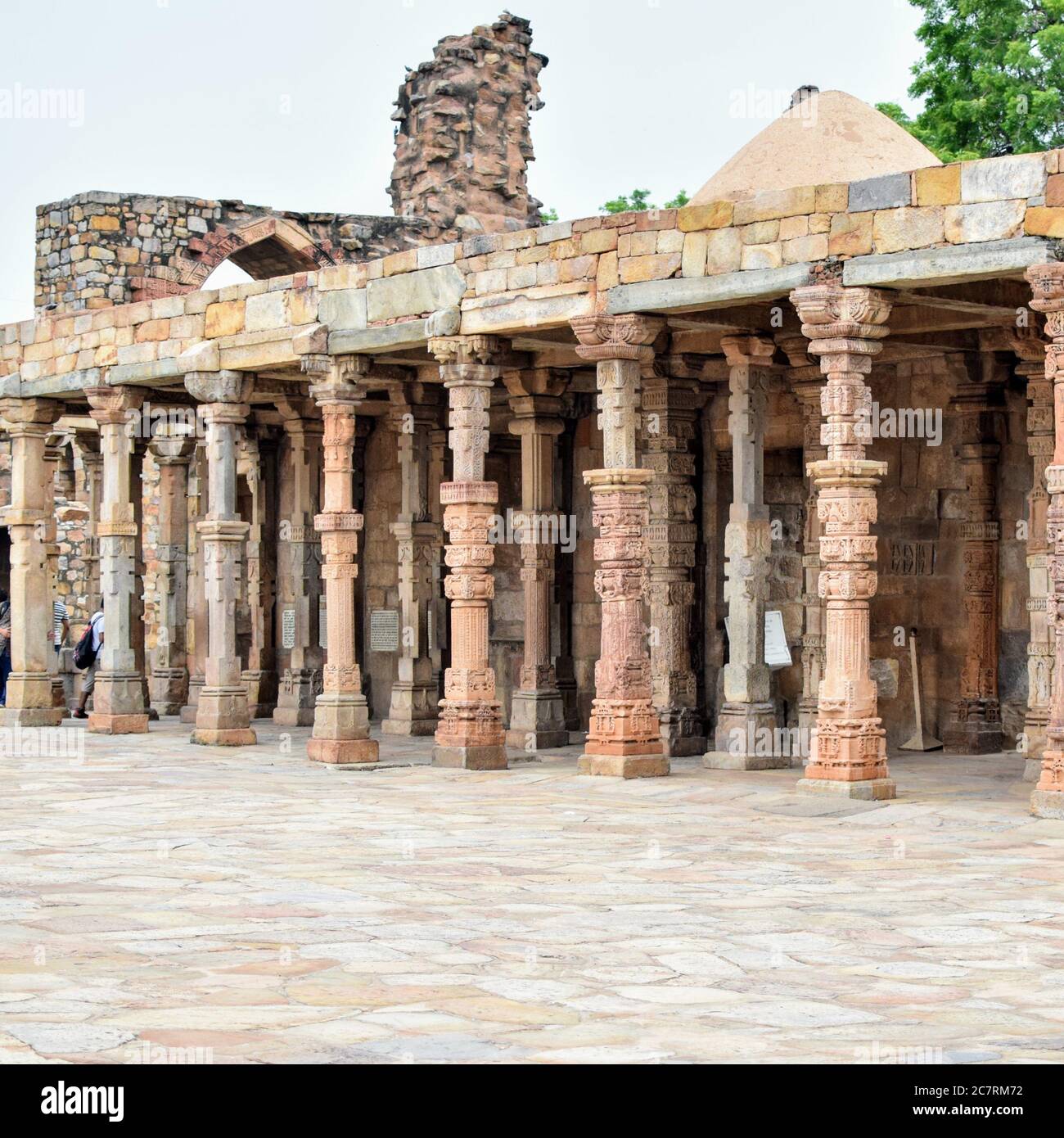 Inside the Qutub Minar Complex with antic ruins and inner square. UNESCO World Heritage in ...