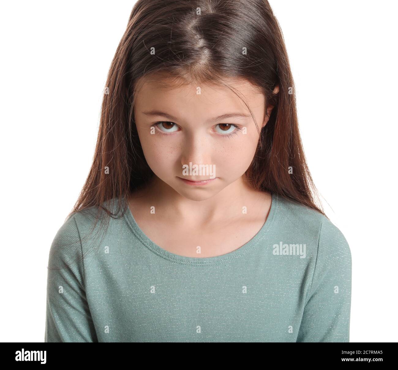 Apologizing little girl on white background Stock Photo - Alamy