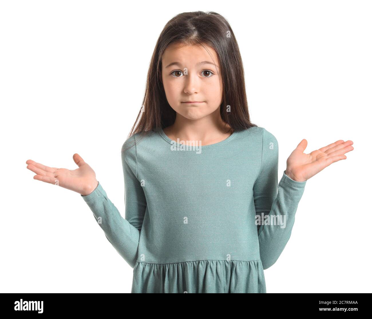 Apologizing little girl on white background Stock Photo - Alamy