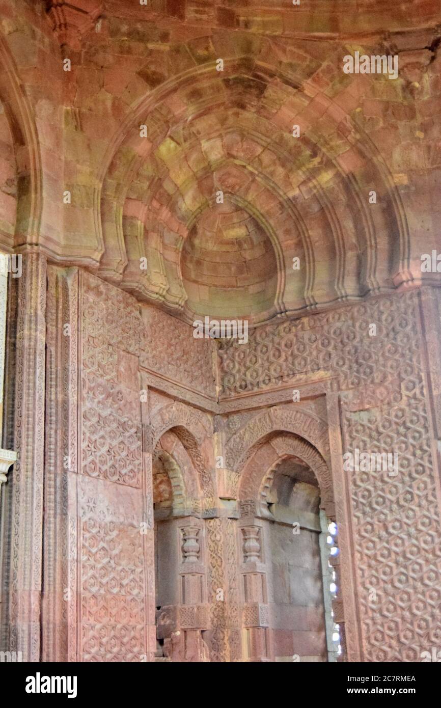 Inside the Qutub Minar Complex with antic ruins and inner square ...