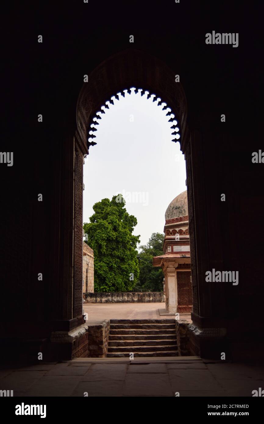 Inside the Qutub Minar Complex with antic ruins and inner square ...
