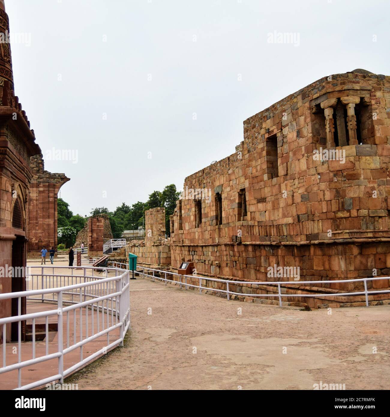 Inside the Qutub Minar Complex with antic ruins and inner square ...