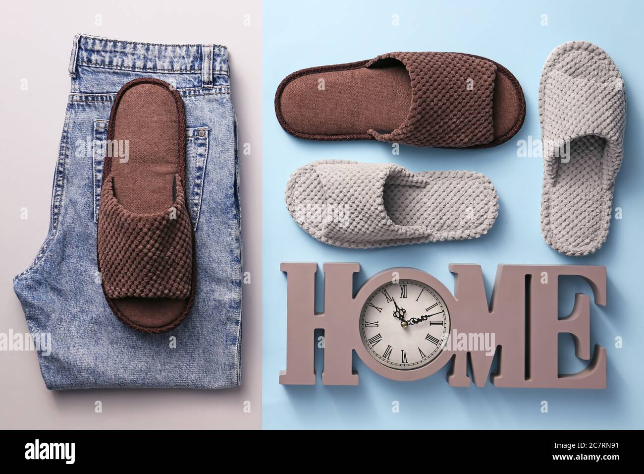 Soft slippers, clothes and decorative clock on color background Stock ...