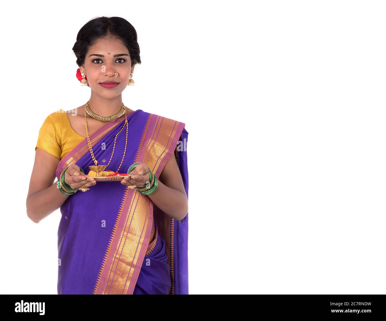 Indian woman performing worship, portrait of a beautiful young lady ...