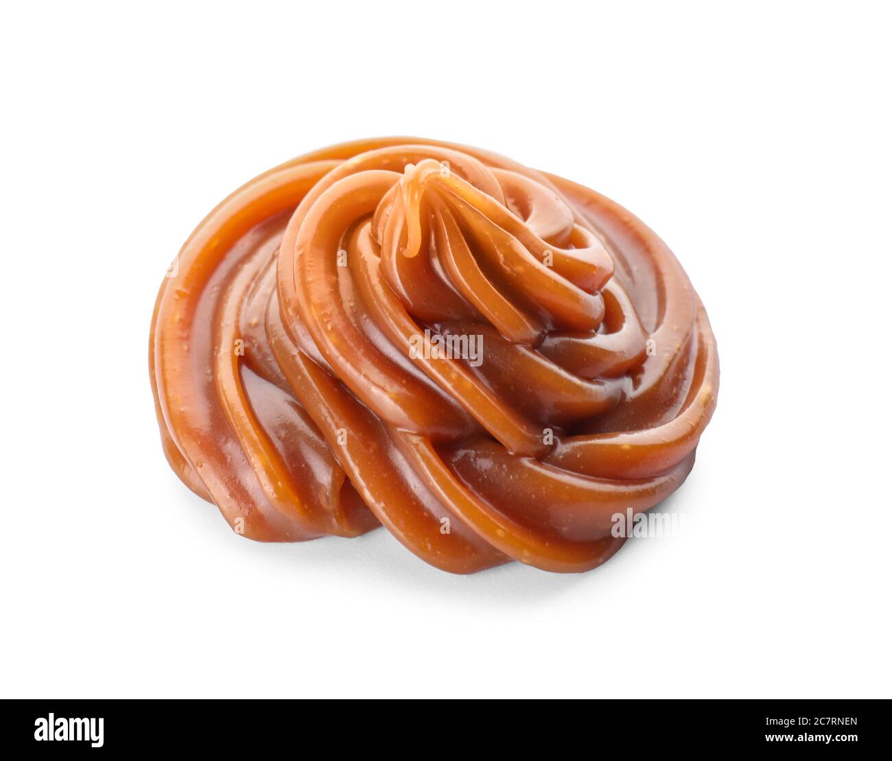 Liquid caramel on white background Stock Photo - Alamy