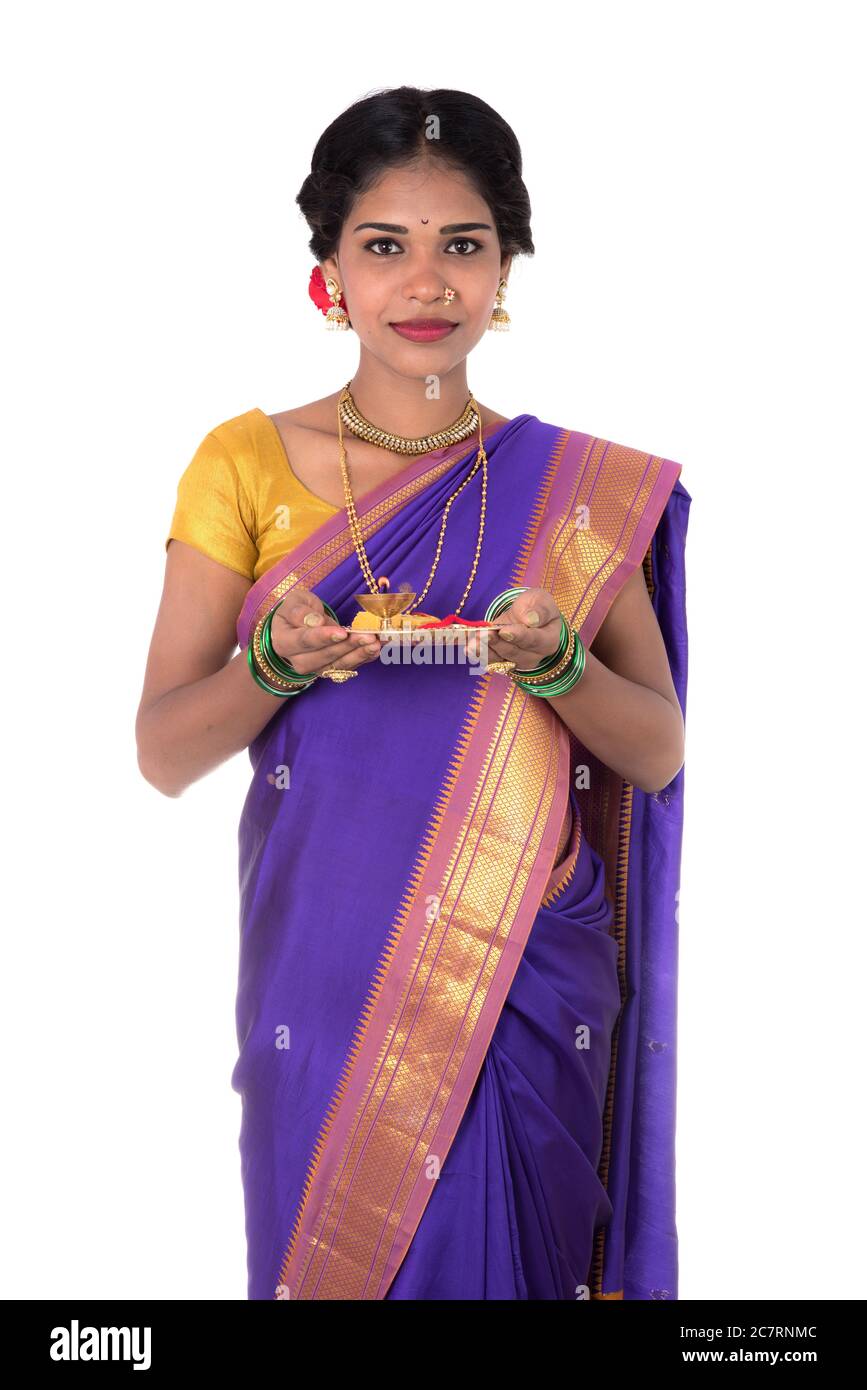 Indian woman performing worship, portrait of a beautiful young lady ...