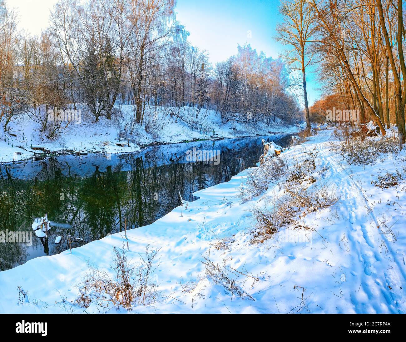 Scenic view of the river and trees covered by snow Stock Photo - Alamy