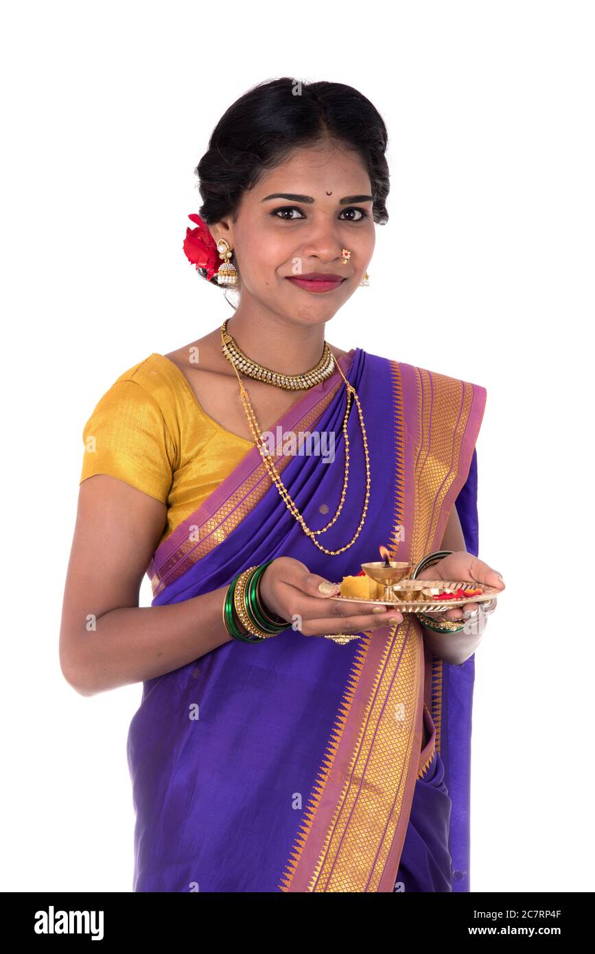 Indian woman performing worship, portrait of a beautiful young lady ...