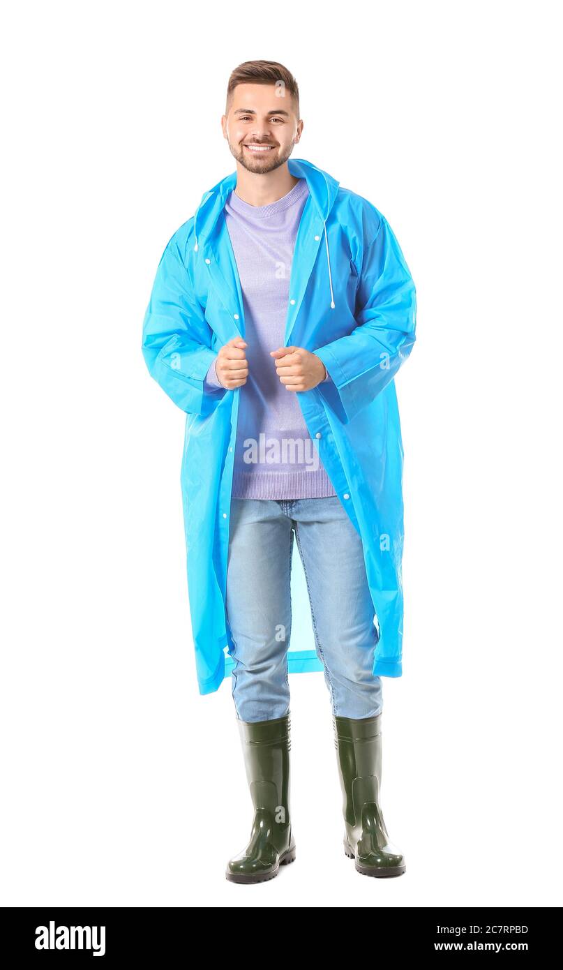 Young man in raincoat on white background Stock Photo - Alamy