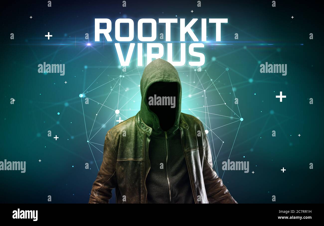 Mysterious hacker with ROOTKIT VIRUS inscription, online attack concept ...