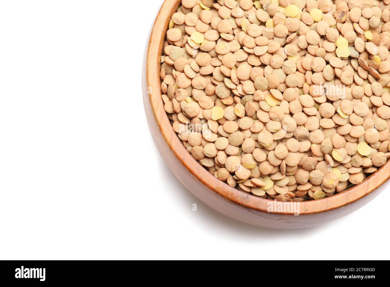 Raw lentils in bowl on white background Stock Photo - Alamy