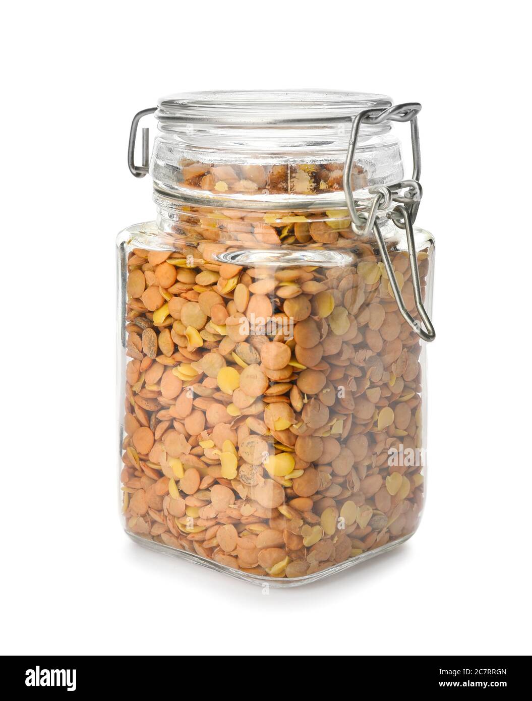 Raw lentils in jar on white background Stock Photo - Alamy