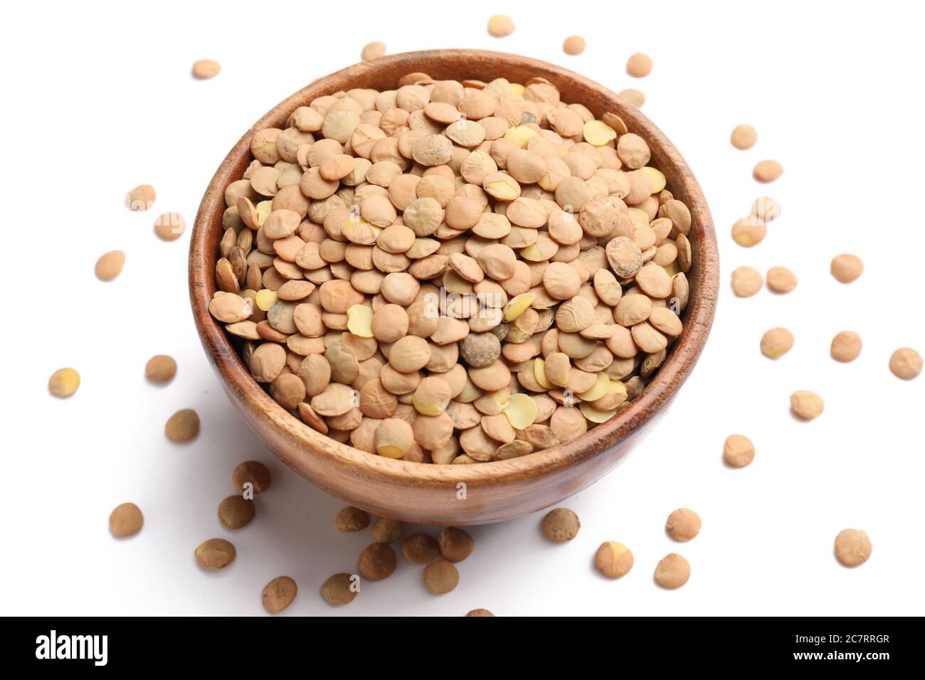 Raw lentils in bowl on white background Stock Photo - Alamy