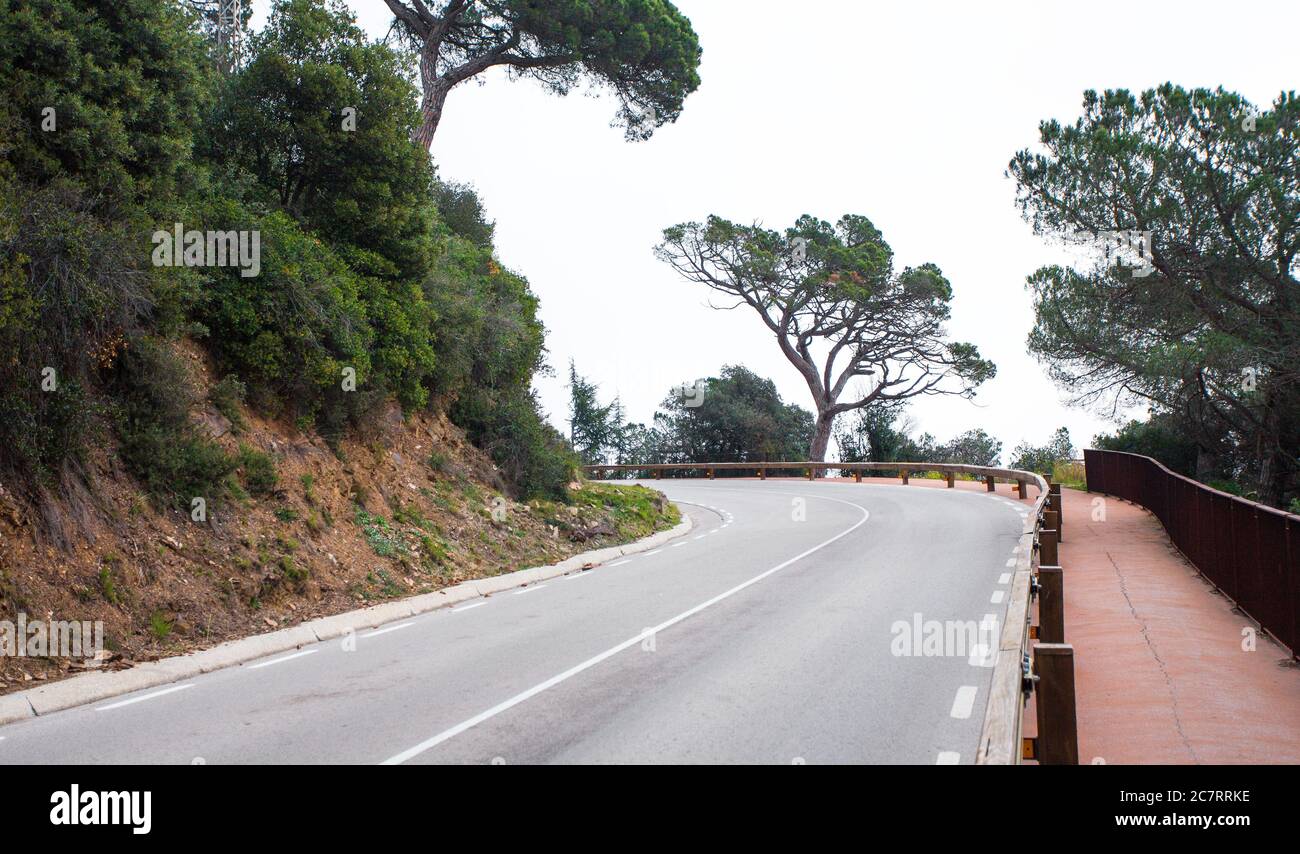 Winding turning asphalt road hi-res stock photography and images - Alamy
