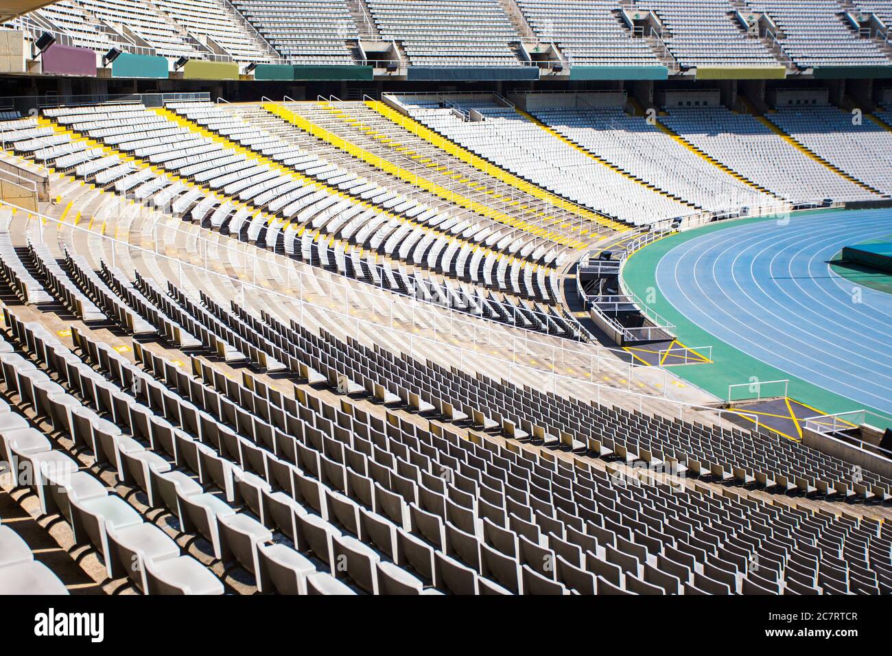 sport concept - empty big stadium with plastic chairs Stock Photo - Alamy