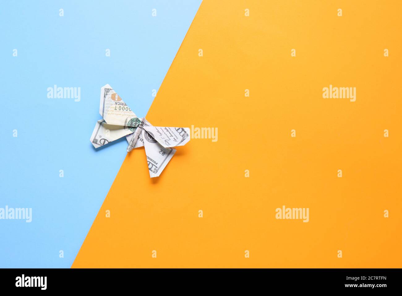 Origami butterfly made of dollar banknote on color background Stock ...