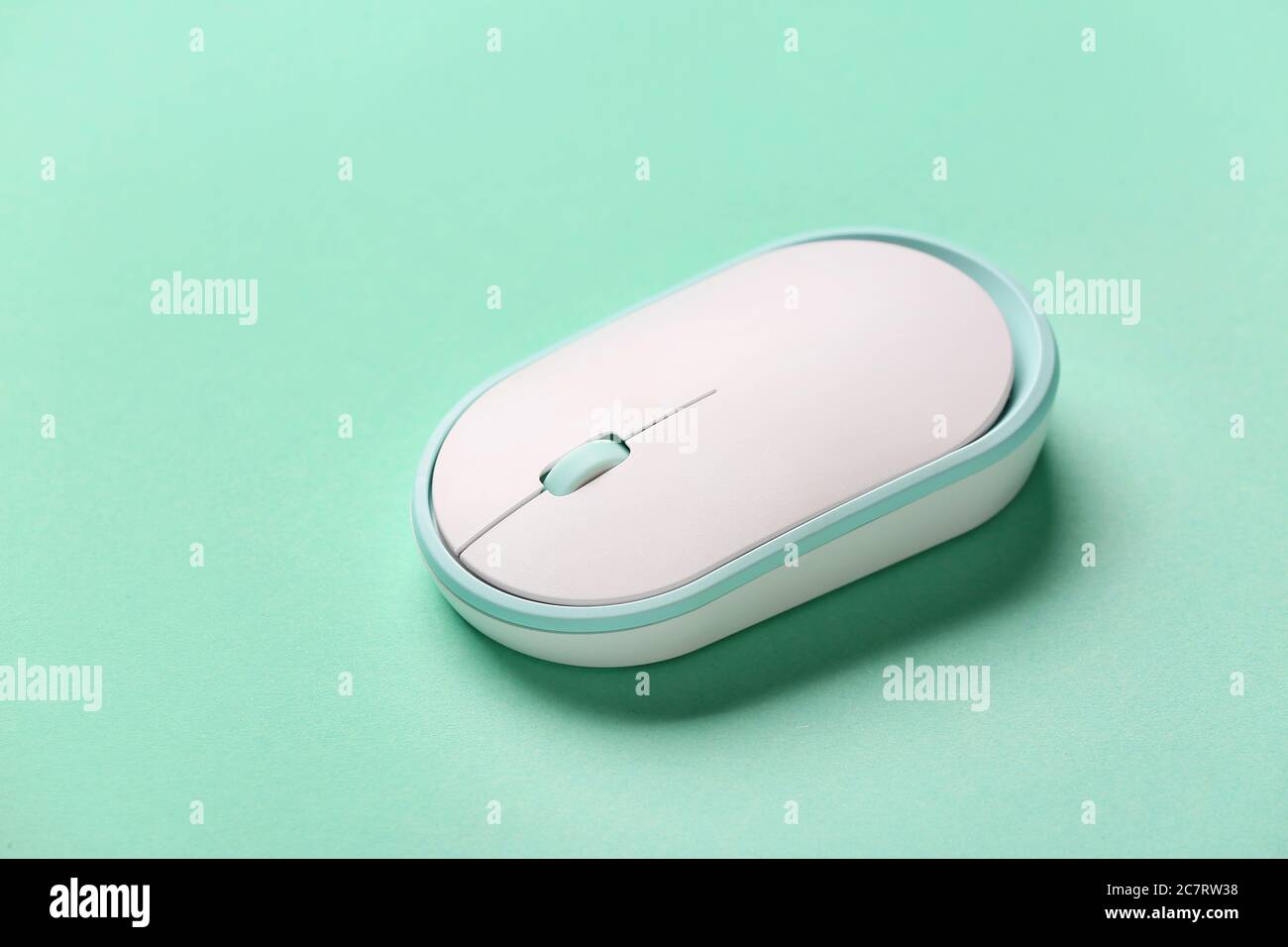 Modern computer mouse on color background Stock Photo - Alamy