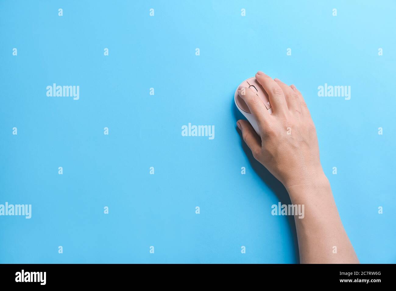 Female hand with modern computer mouse on color background Stock Photo ...