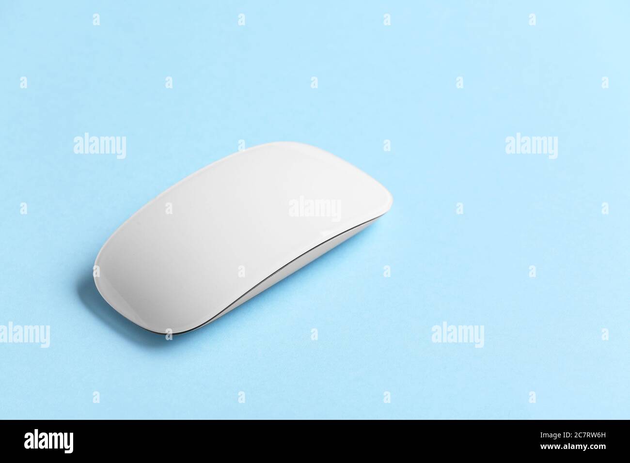 Modern computer mouse on color background Stock Photo - Alamy