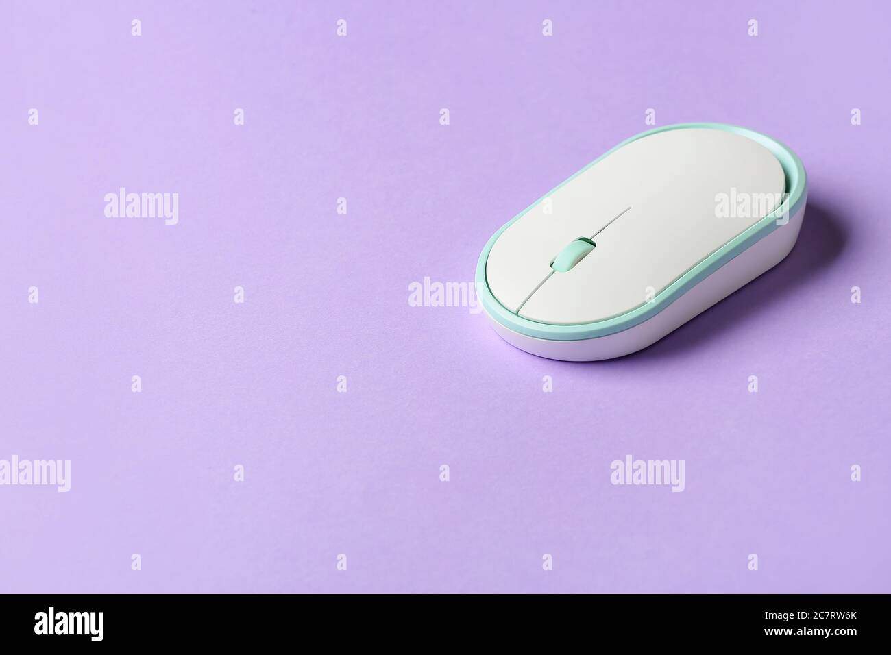 Modern computer mouse on color background Stock Photo - Alamy