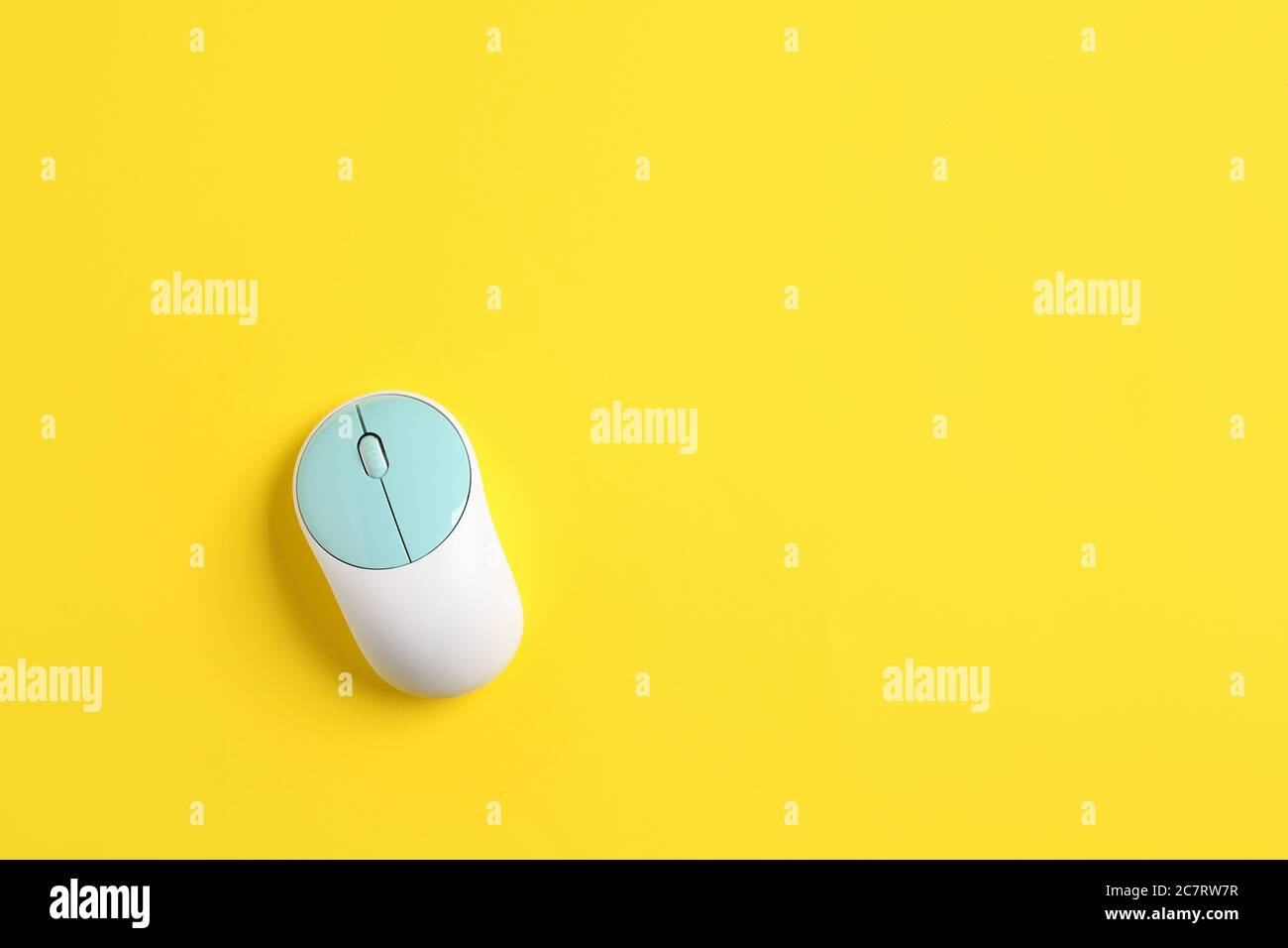 Modern computer mouse on color background Stock Photo - Alamy