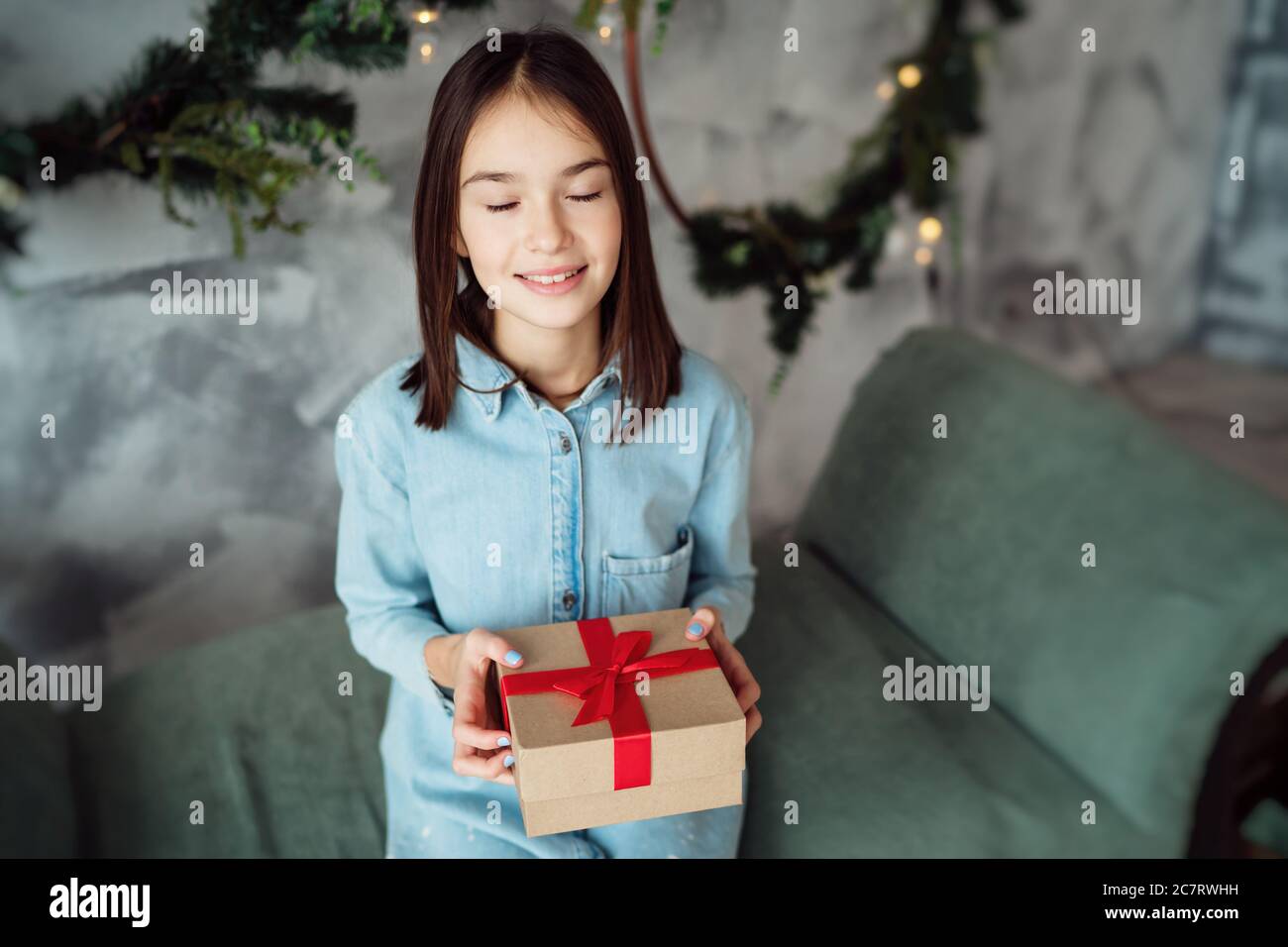 Happy child girl opening christmas gift box Stock Photo - Alamy