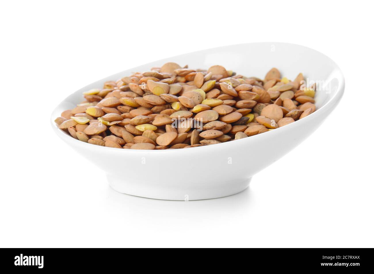 Plate with lentils on white background Stock Photo - Alamy