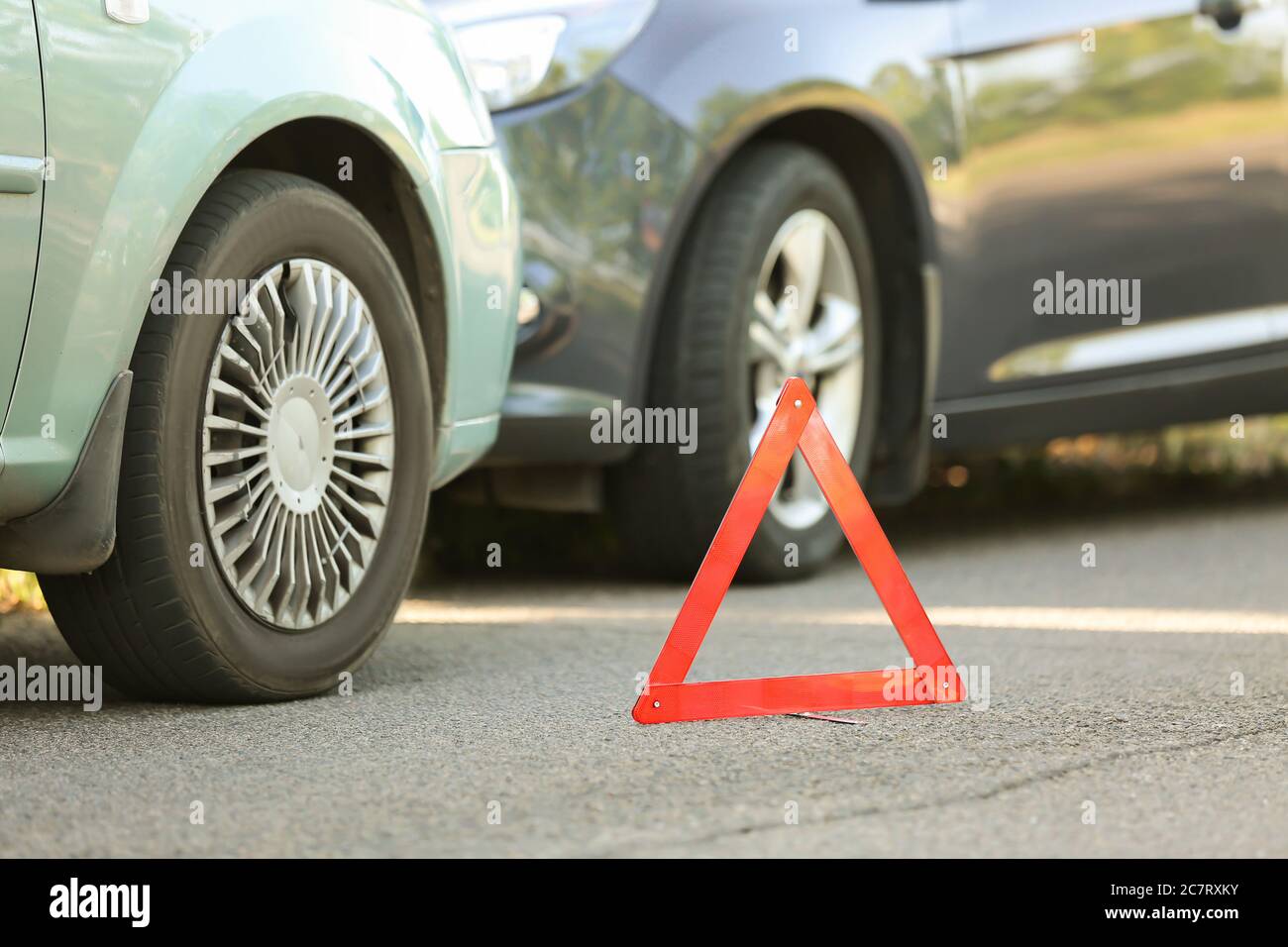 Emergency stop sign near broken cars after accident on road Stock Photo ...