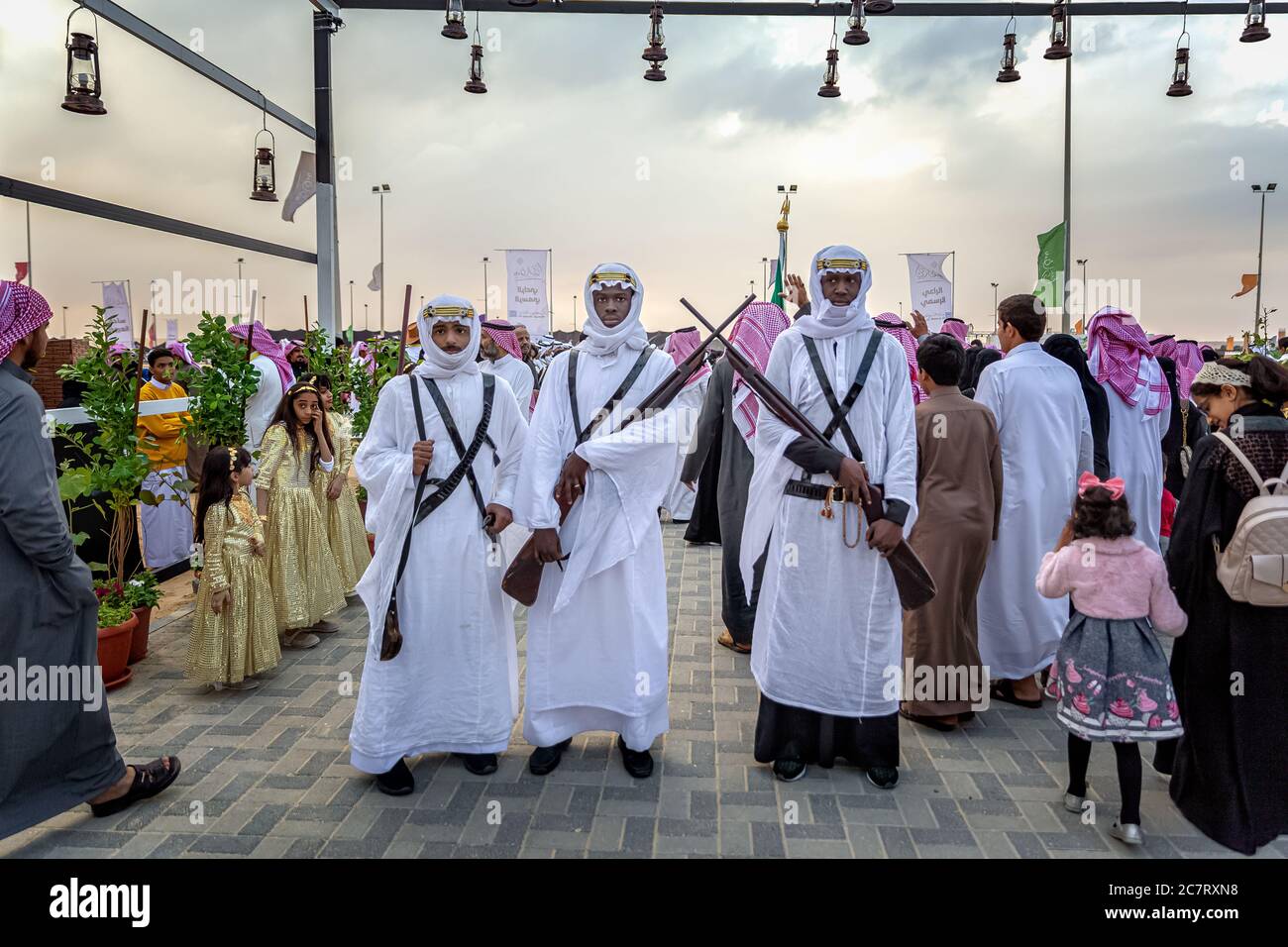 Group of Saudi Arabs performing traditional saudi arabian dance in ...