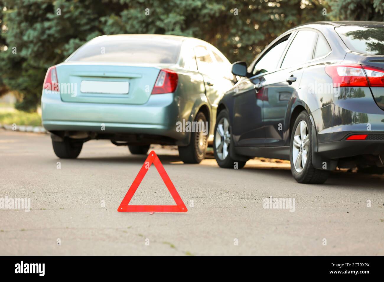 Emergency stop sign near broken cars after accident on road Stock Photo ...