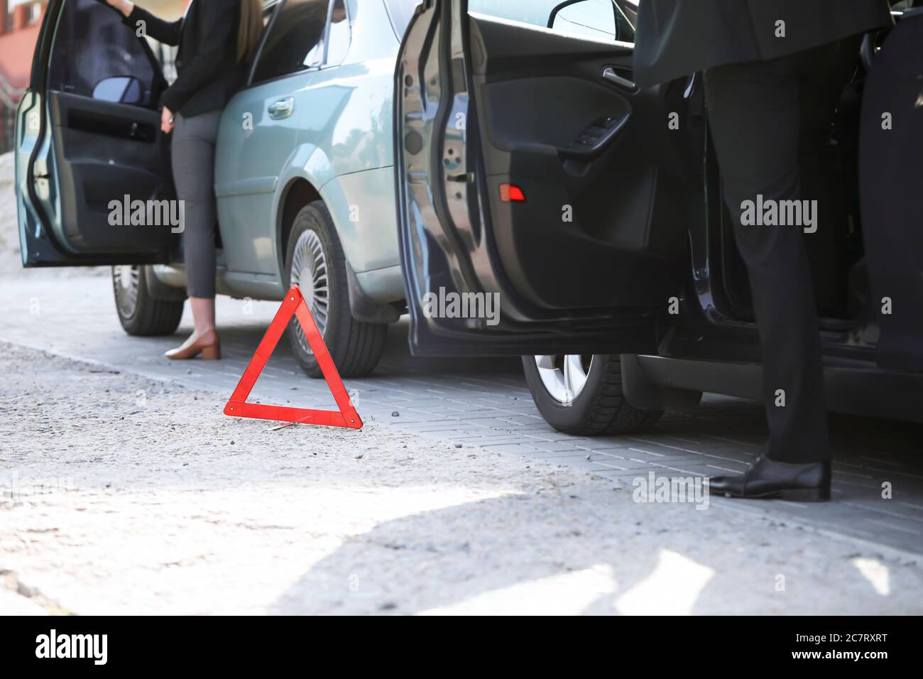Emergency stop sign near broken cars after accident on road Stock Photo ...