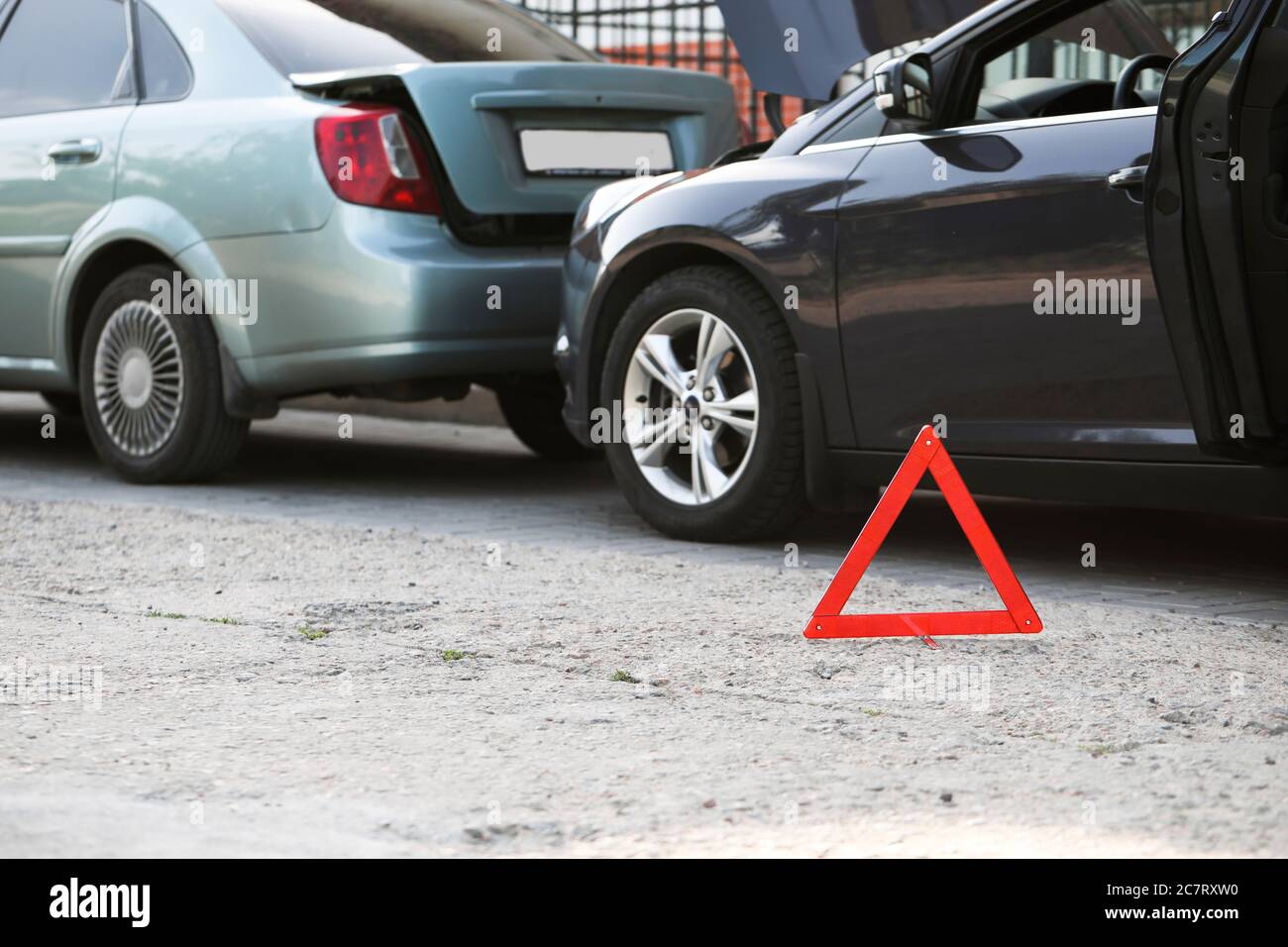 Emergency stop sign near broken cars after accident on road Stock Photo ...