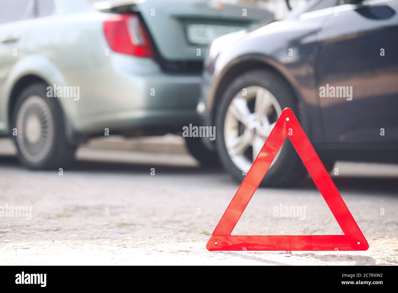 Emergency stop sign near broken cars after accident on road Stock Photo ...