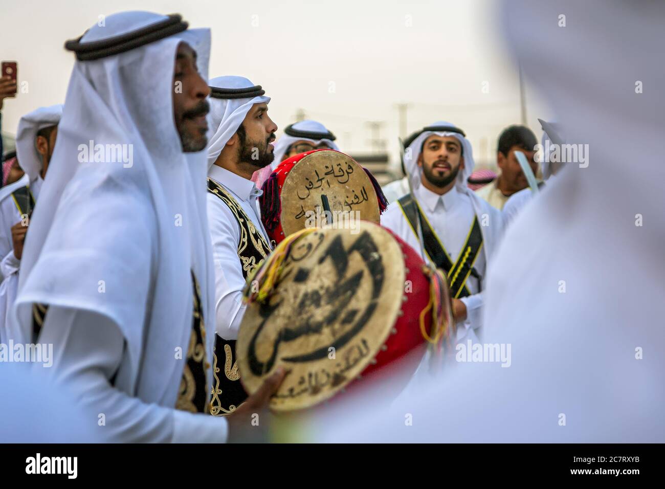 Group of Saudi Arabs performing traditional saudi arabian dance in ...
