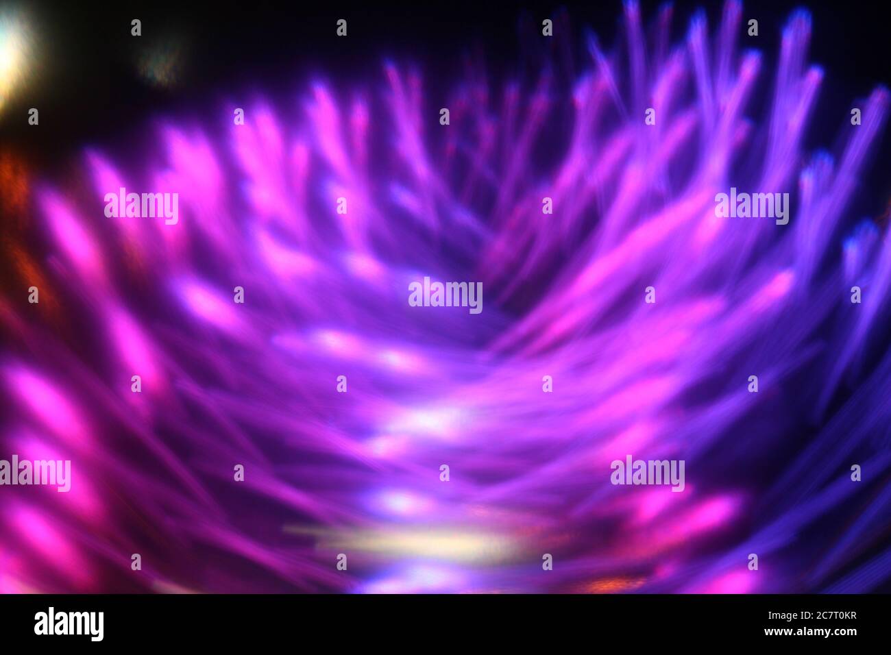 Closeup shot of staggered and refracted light layers vortex light ...