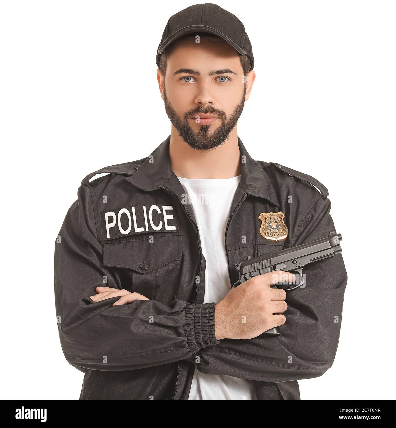 Handsome policeman with gun on white background Stock Photo - Alamy