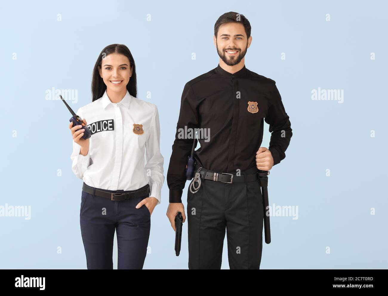 Police officers on light background Stock Photo - Alamy