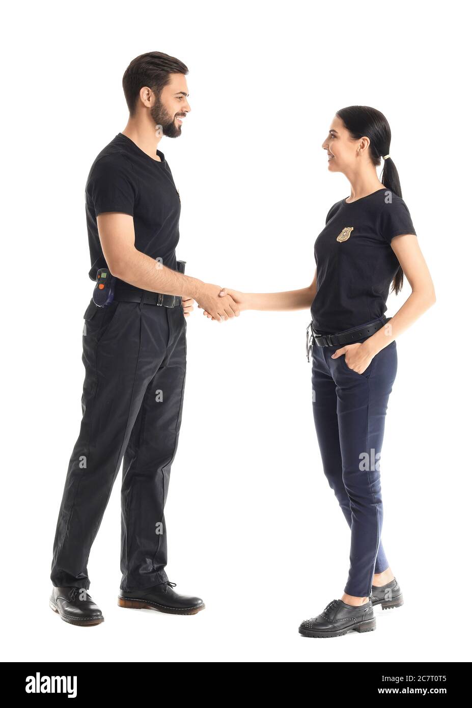 Police officers shaking hands on white background Stock Photo - Alamy