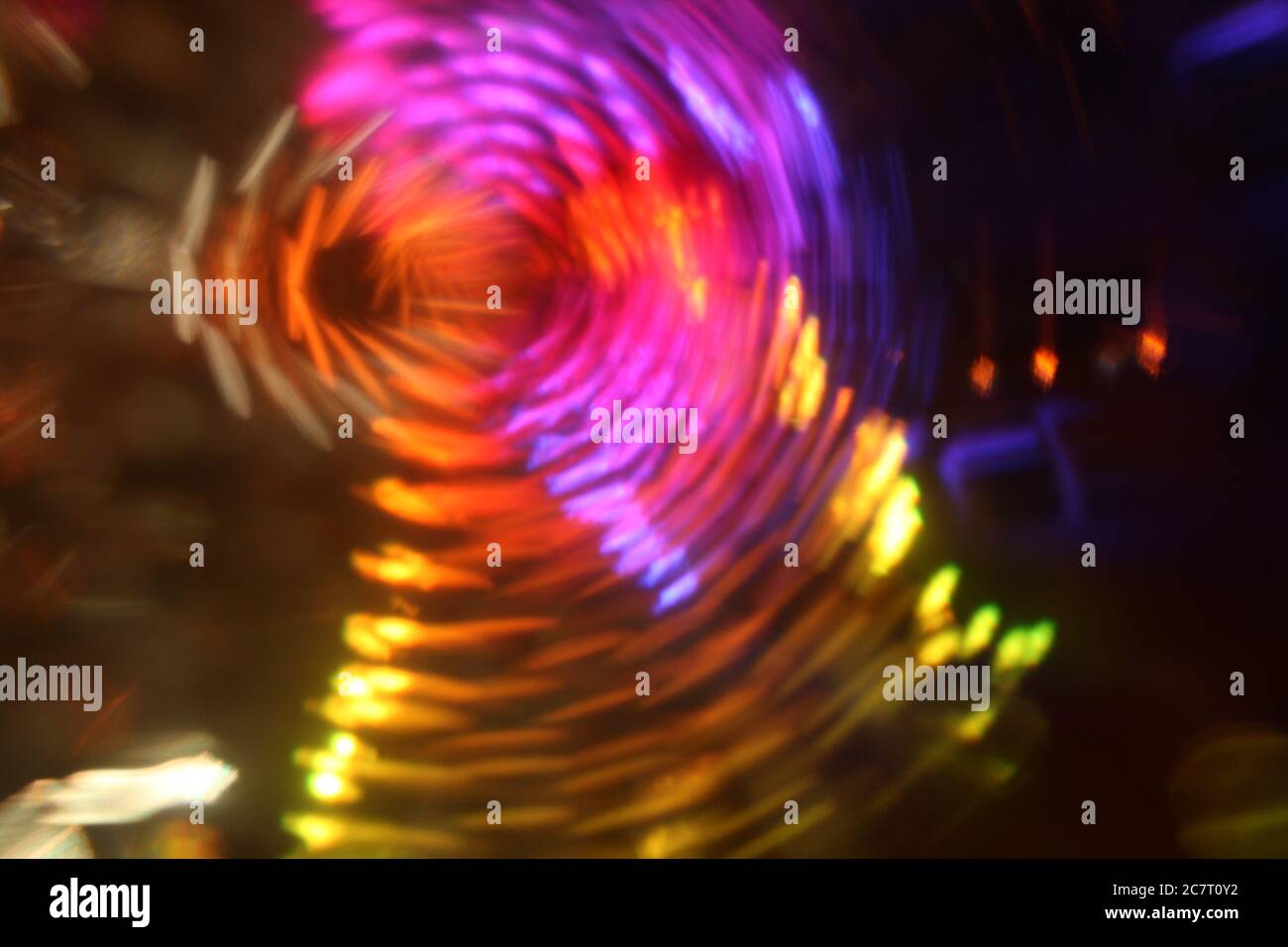 Closeup shot of staggered and refracted light layers vortex light ...