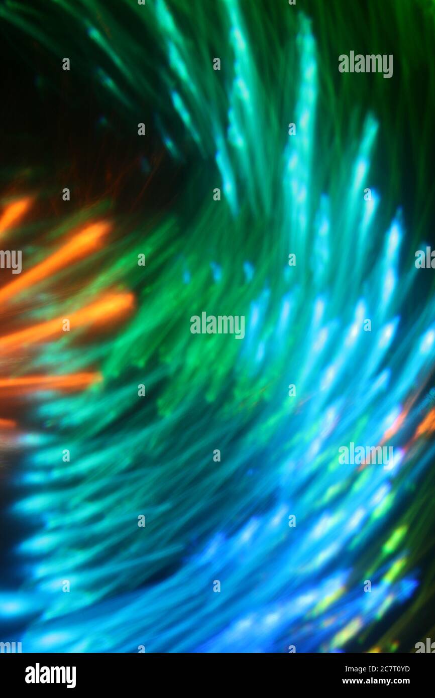 Vertical shot of staggered and refracted light layers vortex light ...