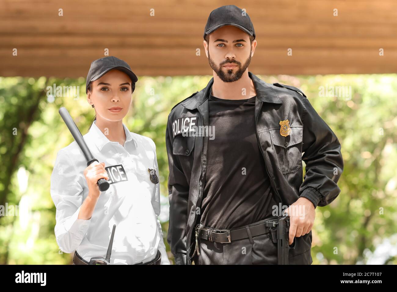 Police officers on city street Stock Photo - Alamy