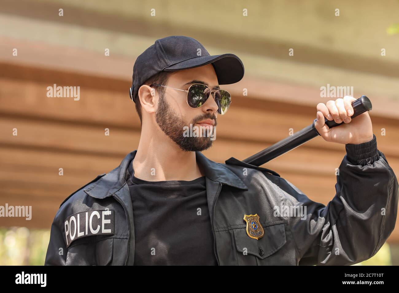 Police officer with baton hi-res stock photography and images - Alamy
