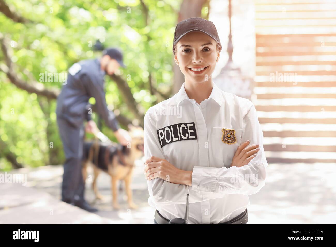 Young female police officer outdoors Stock Photo - Alamy