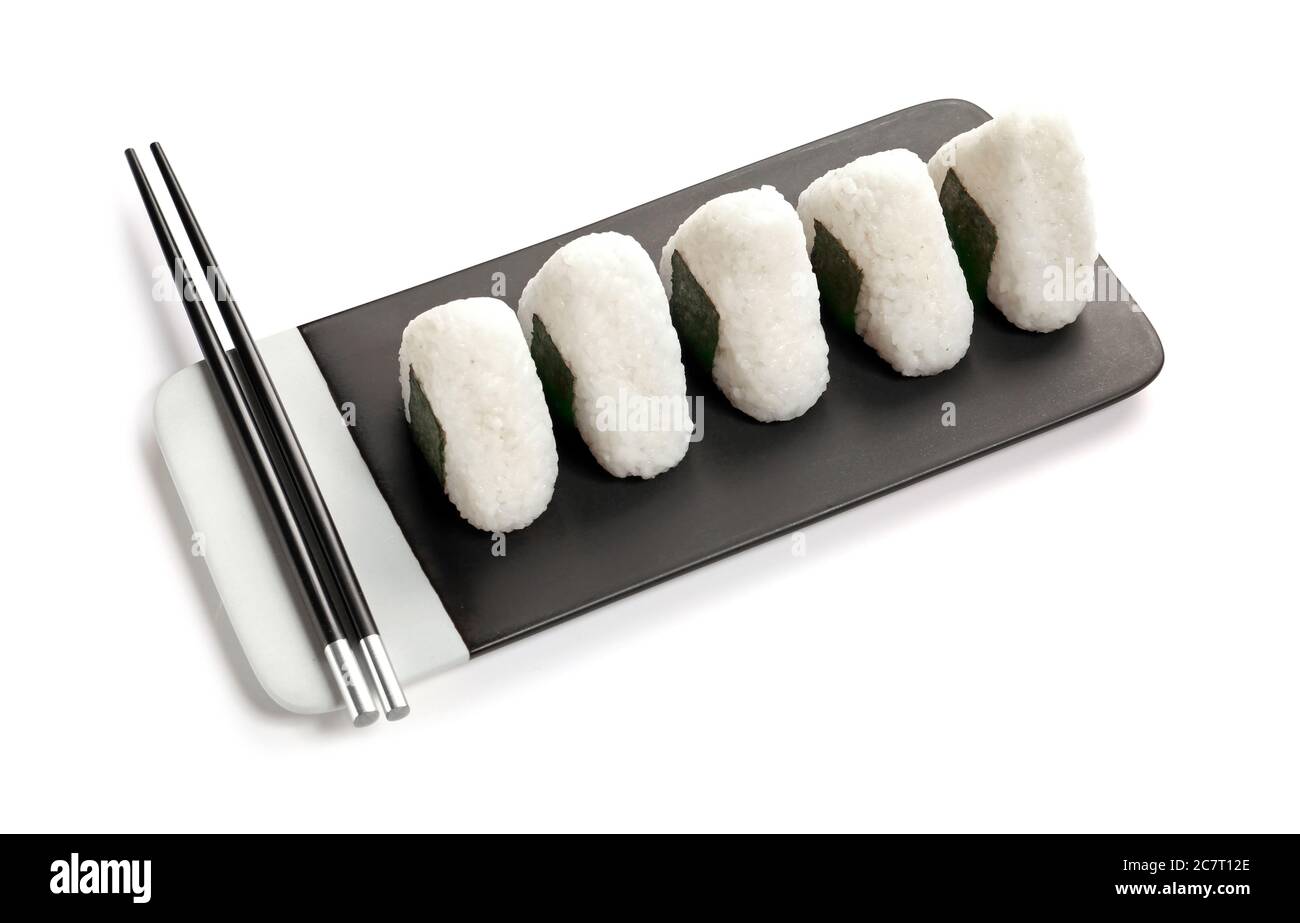 Plate with traditional Japanese onigiri on white background Stock Photo ...